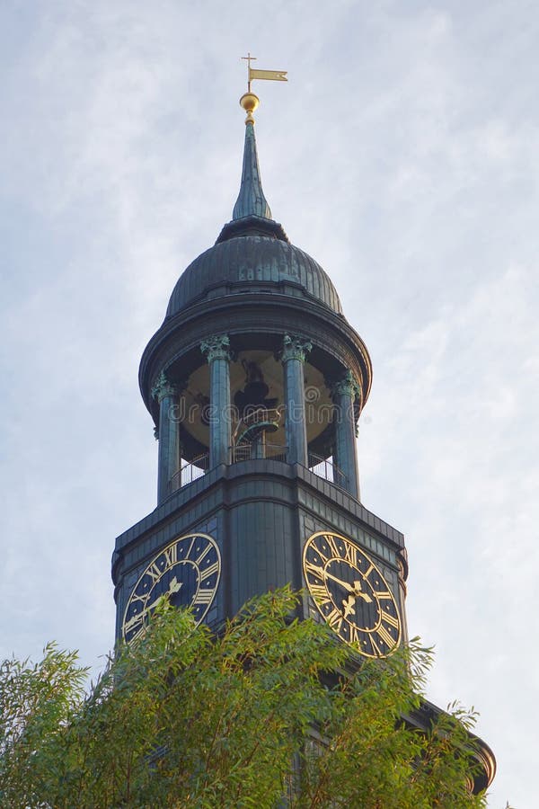 Spire with golden clocks stock image. Image of steeple - 59667115