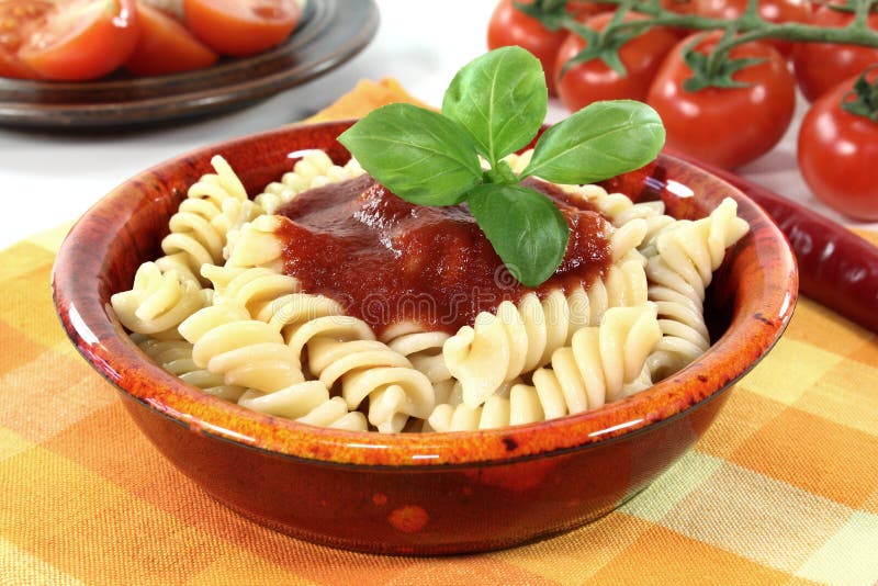 Spirelli with tomato sauce stock image. Image of fusilli - 22927301