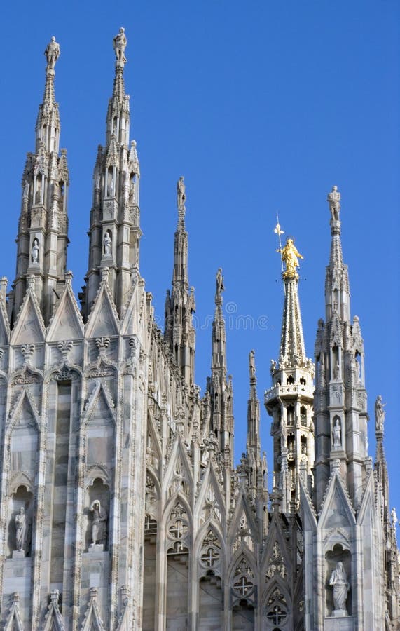 Spires of Duomo with Statue Stock Image - Image of european, roof: 7182939