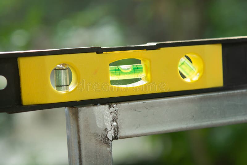 Spirit Level or Construction Water Level on Steel Pipe Stock Image ...