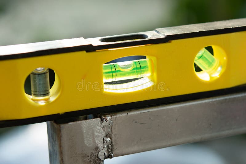Spirit Level or Construction Water Level on Steel Pipe Stock Image ...