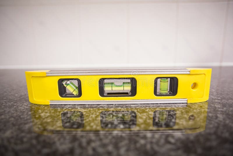 Spirit Level on the Counter Stock Photo - Image of worktop, home: 47014622