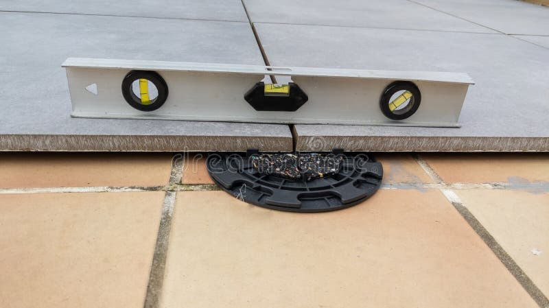 Spirit Level on Floor Tile with Pedestal Support with Integrated Slope ...