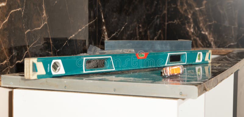 Spirit Level on Kitchen Countertop. Home Stock Image - Image of spirit ...