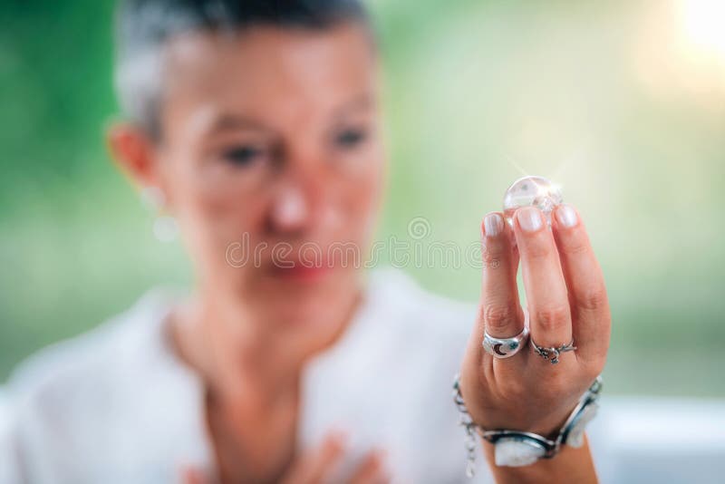 Spiritually Enlightened Person Focused on a Crystal Pearl Stock Image ...