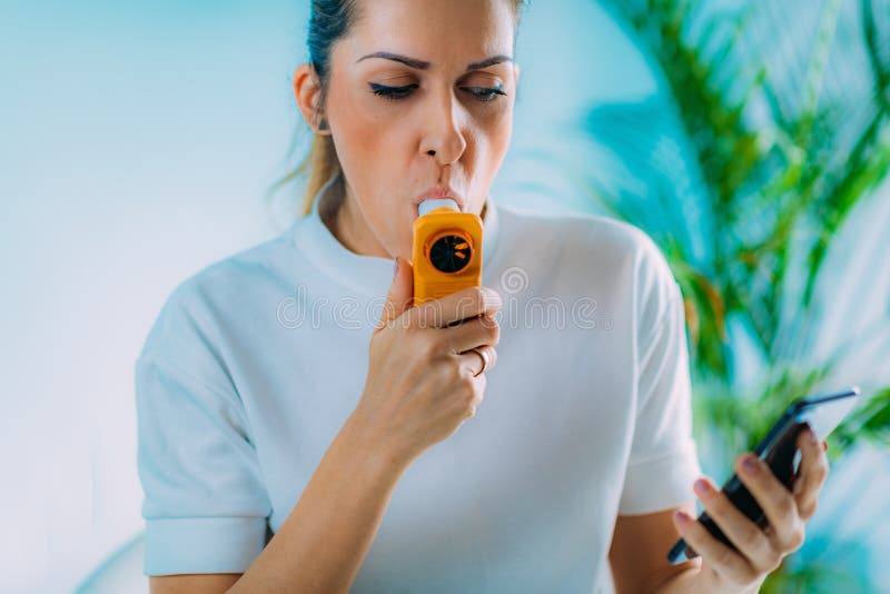 Spirometry. Using Spirometer and Smart Phone Stock Photo - Image of ...