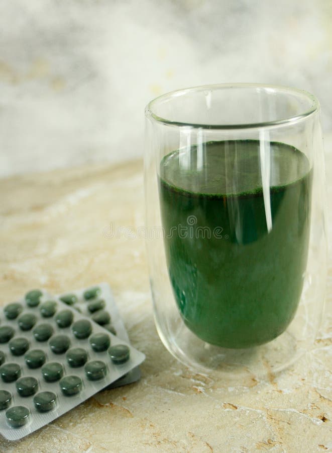 Spirulina Tablets and Tea on Concrete Background Stock Image - Image of ...