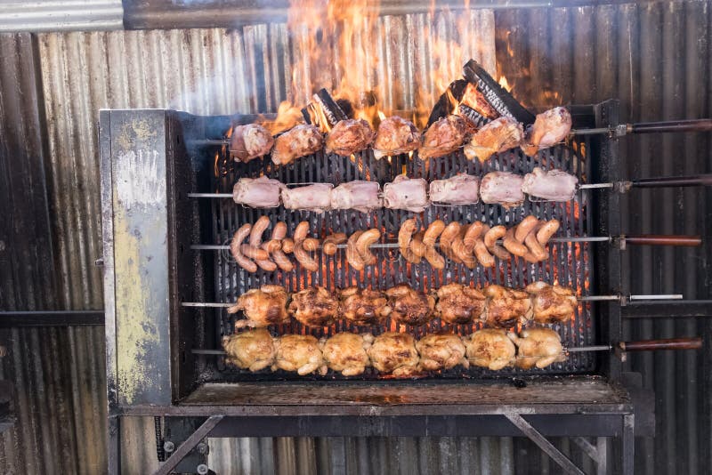 Spit-roast chickens stock image. Image of delicious - 111699151