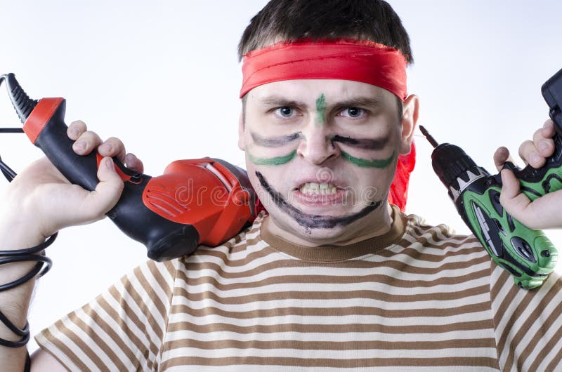 Spiteful Man in War Paint with Two Drills Stock Image - Image of ...