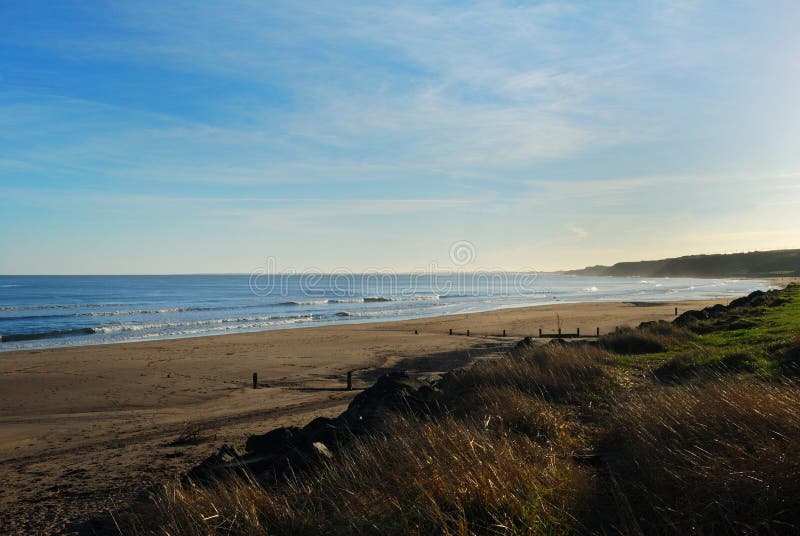 Spittal Beach in Mid Winter Stock Photo - Image of cliffs, horizon ...