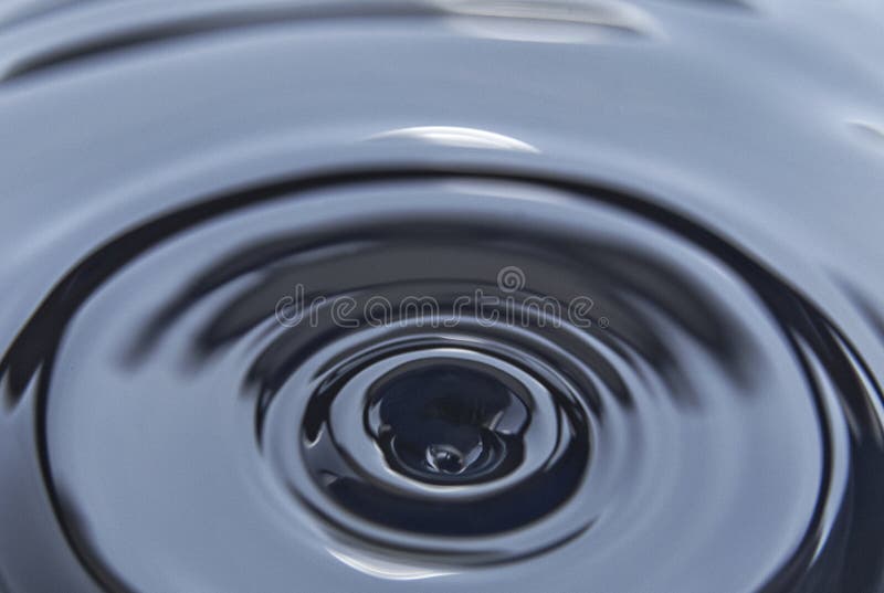 Splash on the Black Petroleum Surface Stock Photo - Image of crude ...