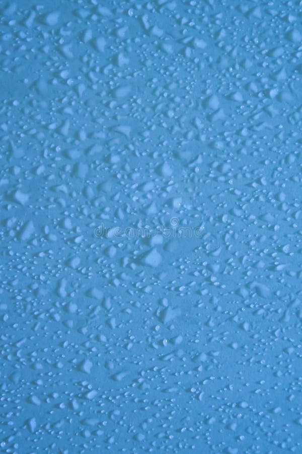 Splash on blue wall stock image. Image of blue, water - 179335555
