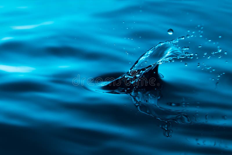 Splash of Blue Water and a Small Wave Close Up Stock Photo - Image of ...