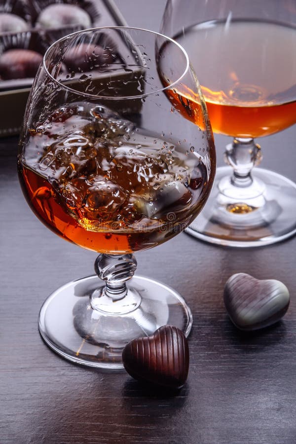 Splash of brandy in glass stock image. Image of liquid - 83450905