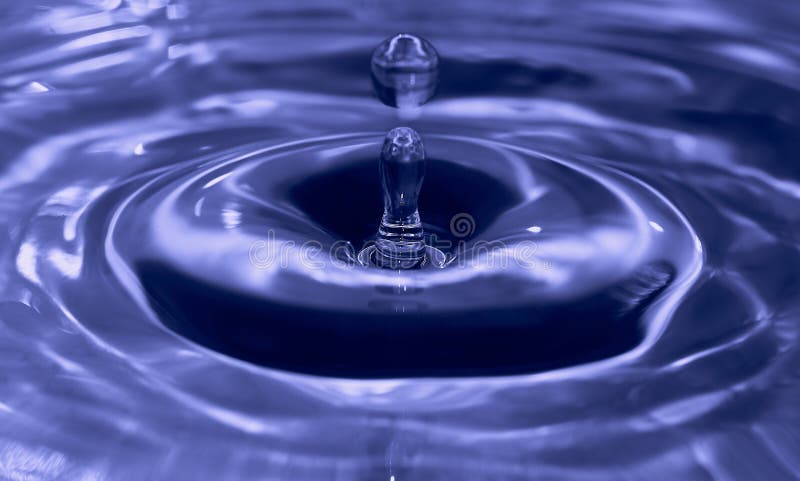 Splash Drop of Water in a Blue Shade Stock Image - Image of rippled ...