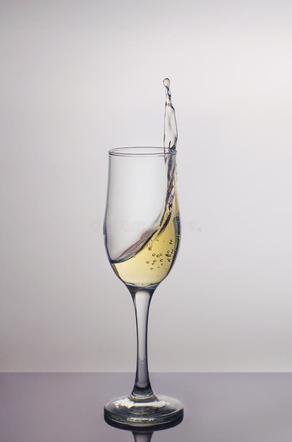 Splash in a Glass of Champagne Stock Photo - Image of splashing, party ...