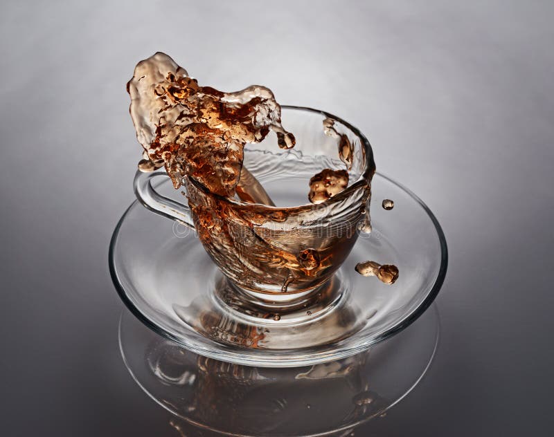 Splash in Glass Cup of Black Tea Stock Photo - Image of black, holidays ...