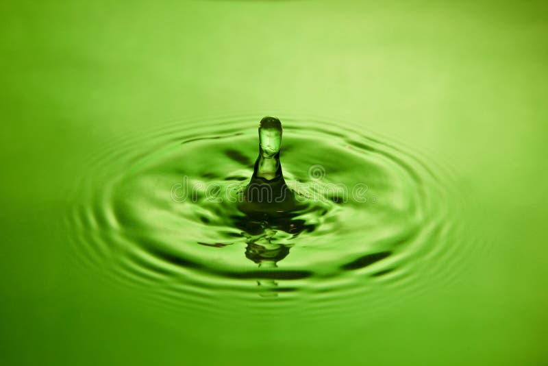 Splash in green stock photo. Image of ripple, droplet - 10893056