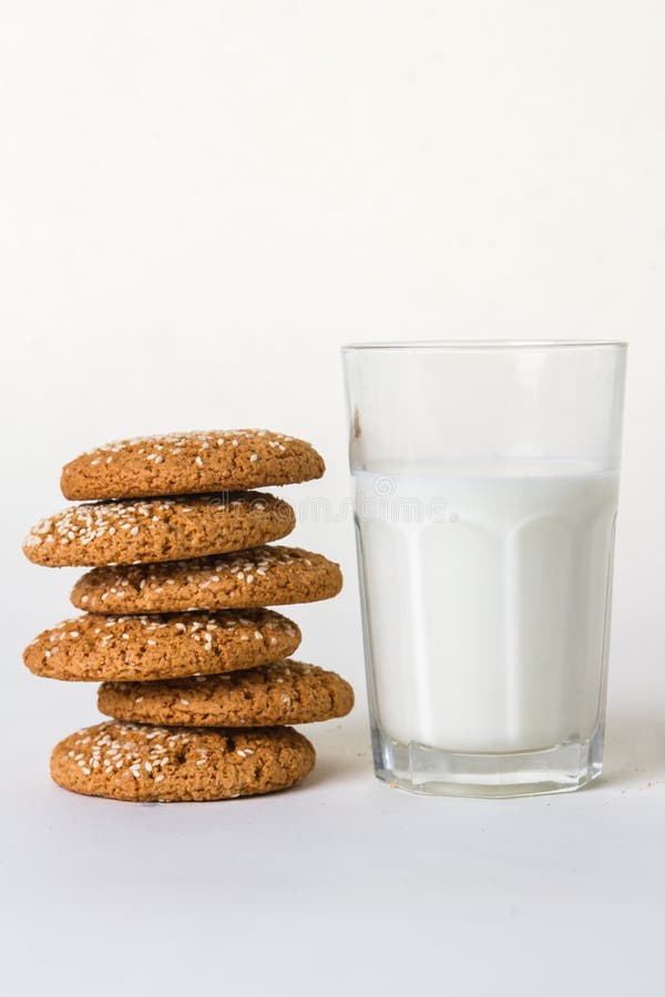Splash of Milk with Biscuits on White Stock Photo - Image of macro ...