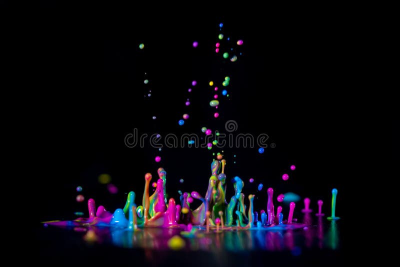 Splash of Multi-colored Ink on a Black Background. Paint Explosion ...