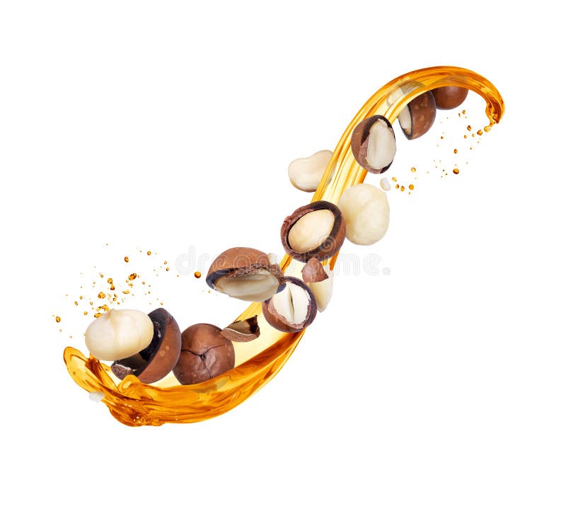Splash of Oily Liquid with Crushed Macadamia Nuts Stock Image - Image ...