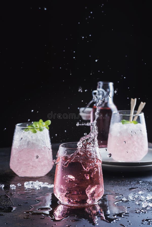 Splash of a pink cocktail stock photo. Image of green - 180094510