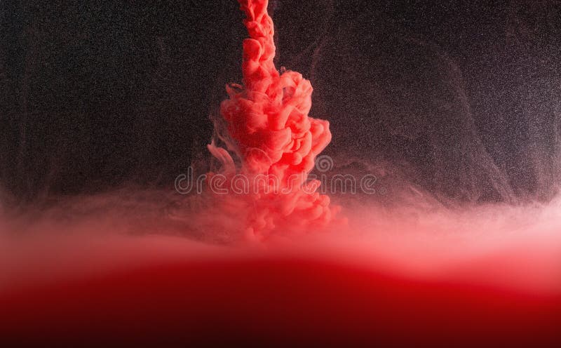 Splash Of Red Ink In Water On A Black Background. Stock Image - Image ...