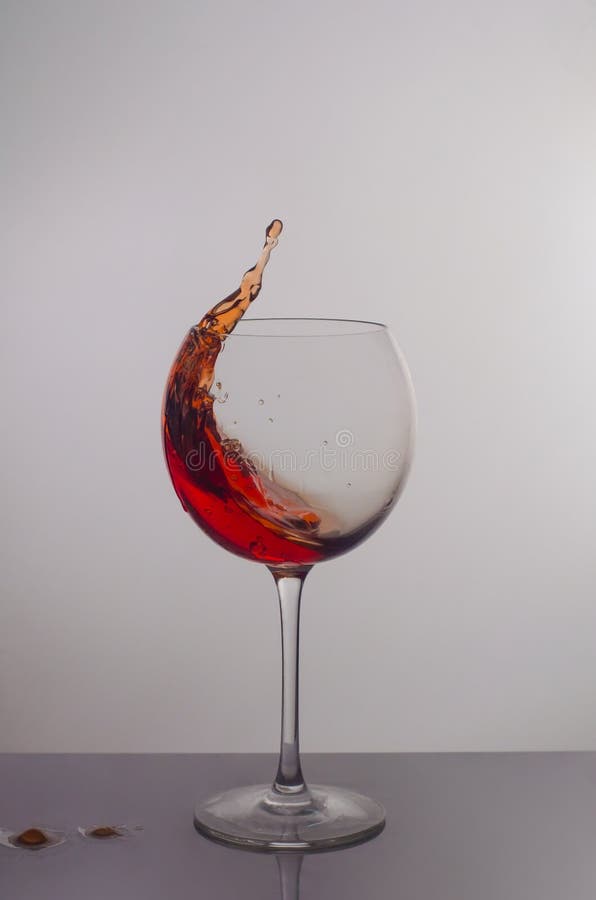 Splash of Red Wine in a Round Glass Stock Photo - Image of alcohol ...