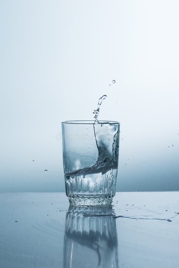 Splash, Splashing of Water or Alcoholic Drink in a Glass Stock Image ...