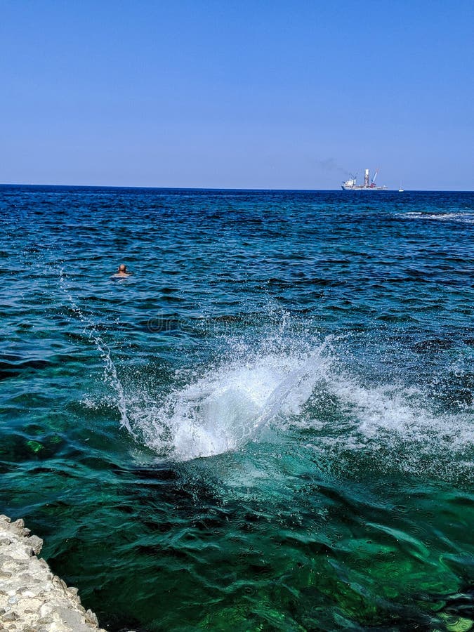 Splash in the water stock image. Image of shore, wave - 188233311
