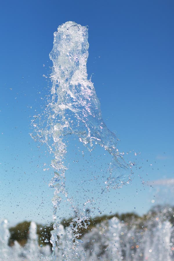 Splash Water Fountain on Blue Sky in Park Stock Image - Image of ...