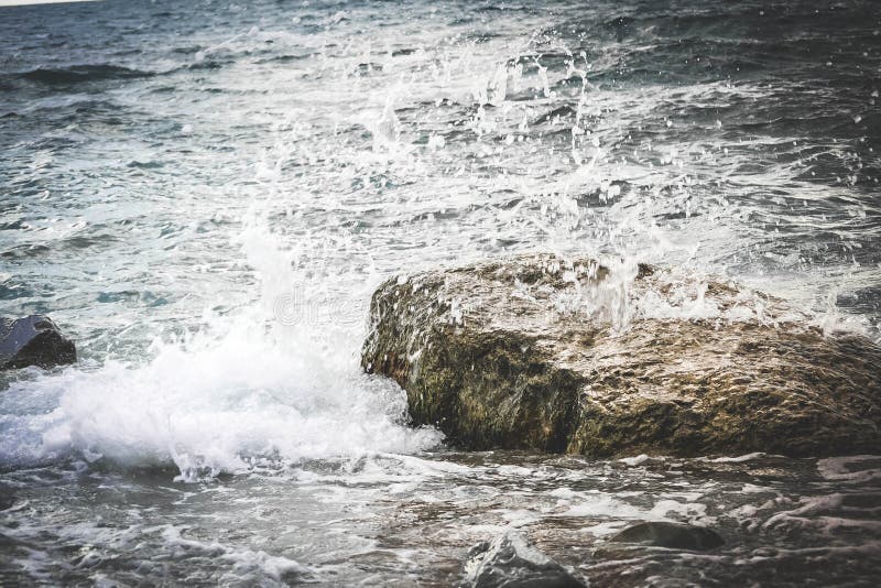 Splash of Water on a Rock in the Sea Stock Image - Image of natural ...