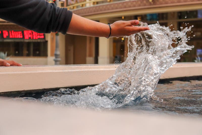 Splash of water stock image. Image of simple, hand, wave - 136611363
