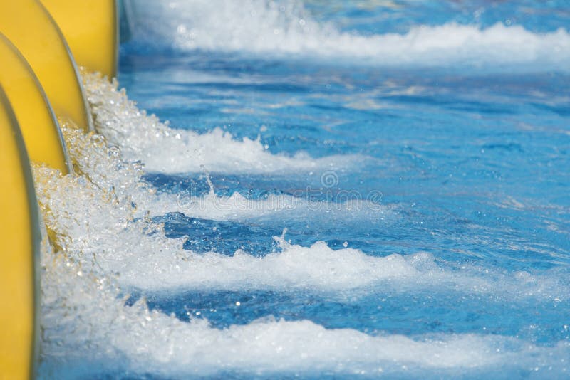 Splash of Water from Slide in Swimming Pool Stock Photo - Image of ...