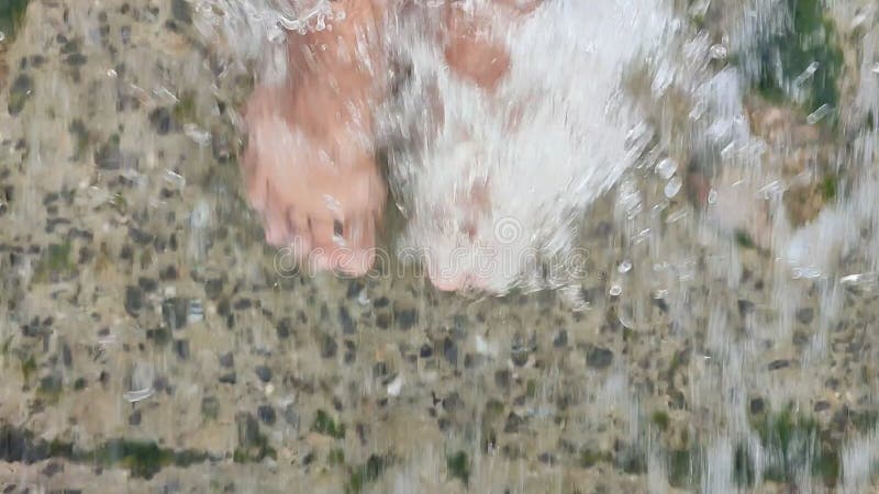 Splash water stock video. Video of splash, feet, rela - 265675641