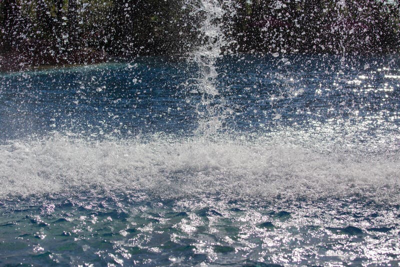 Splash Water from Water Fall in Swimming Pool Stock Image - Image of ...
