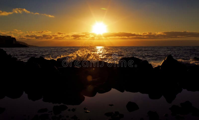 Splash of Wave Over Rocks in the Sunrise Stock Image - Image of sparkle ...