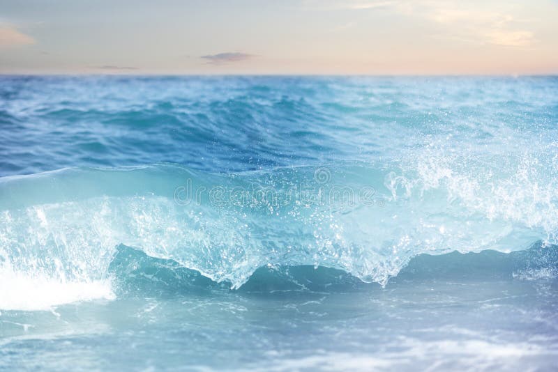 Splash of Wave Over Rocks in the Sunrise Stock Image - Image of sparkle ...