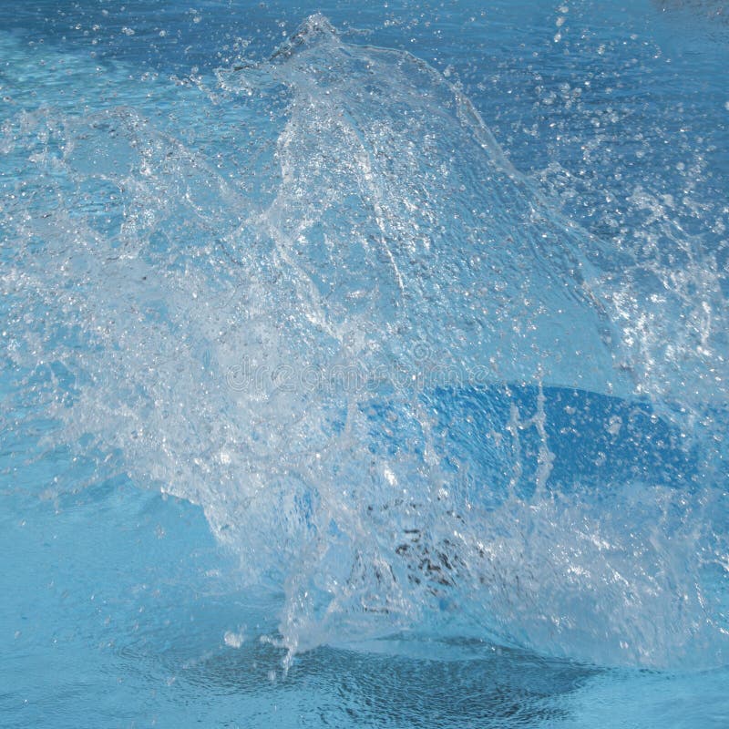 Splashed water in the pool stock image. Image of splash - 128327065