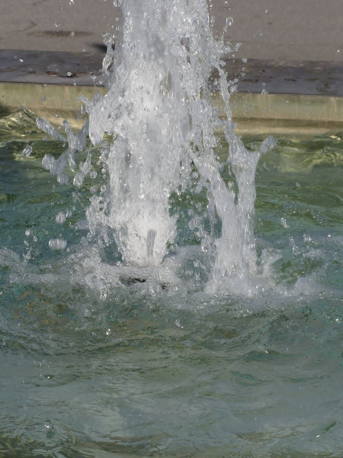 Splashes of Fountain Water in a Sunny Day Stock Image - Image of gush ...
