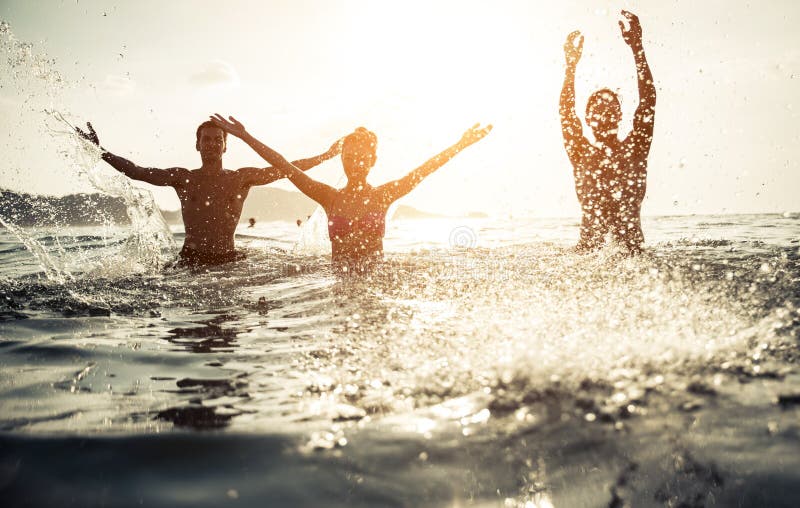 Group of Friends Jumping in the Water from the Boat Stock Photo - Image ...