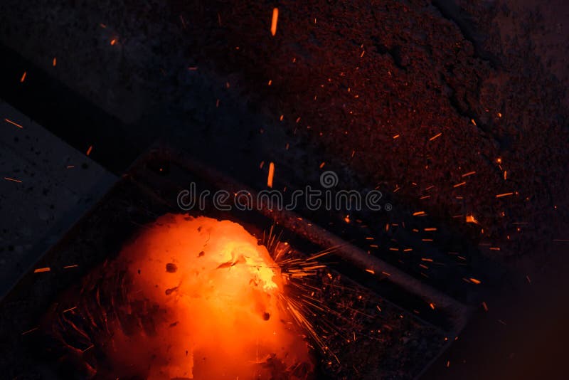 Splashes of Hot Metal Falling To the Floor Stock Photo - Image of flame ...