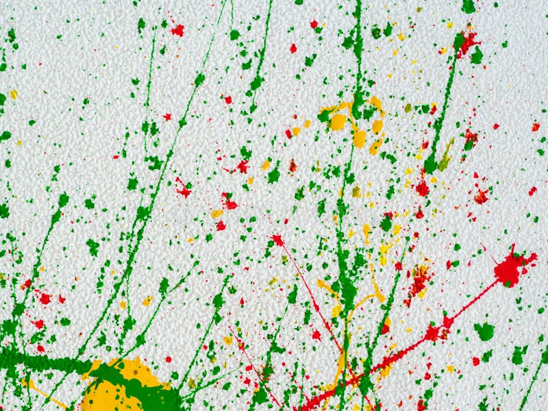 Splashes of Red and Yellow Green Paint on a White Background Stock ...