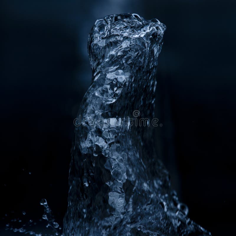 Splashes of spring water stock photo. Image of darkness - 204464448
