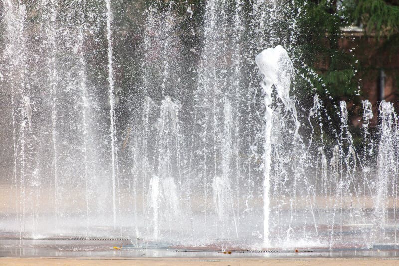 Splashes of Water in a Fountain in the Park Stock Photo - Image of ...