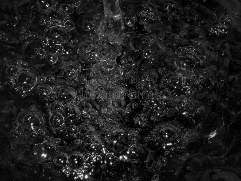 Splashes of Water with a Splash on a Black and White Image Stock Image ...
