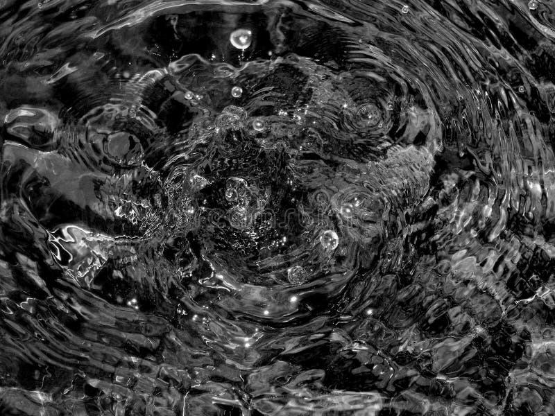 Splashes of Water with a Splash on a Black and White Image Stock Photo ...