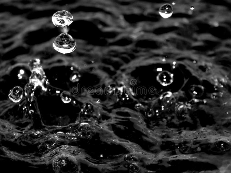 Splashes of Water with a Splash on a Black and White Image Stock Photo ...