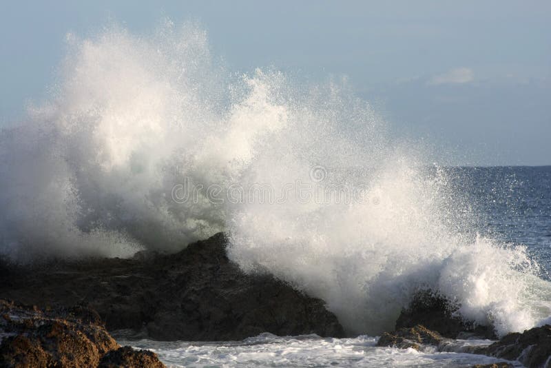 Waves breaking on rocks stock image. Image of coastline - 8323957
