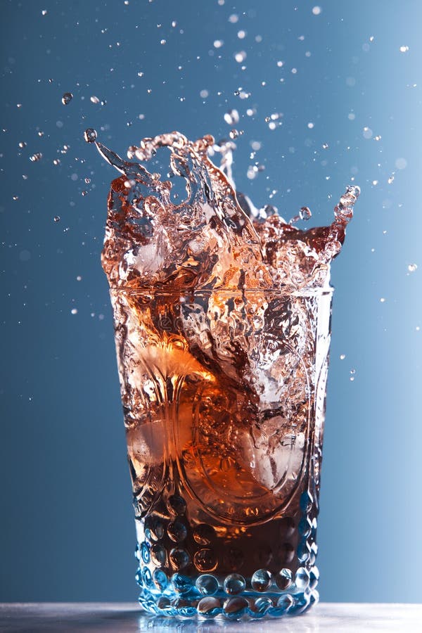 Splashing drink in glass stock photo. Image of drop, cold - 27948594